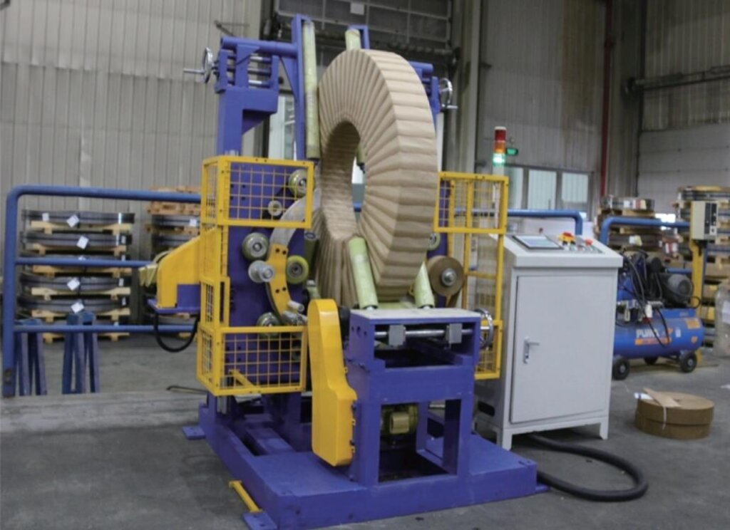 Copper coil wrapping machine packing copper tape and copper wire coils ...